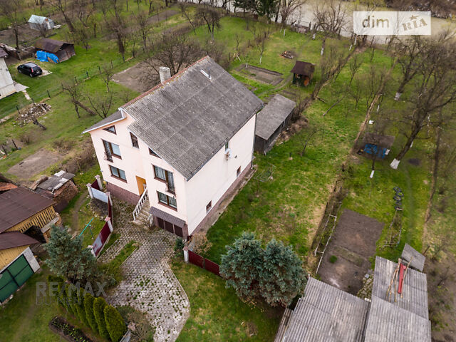 DIM.RIA – Продам будинок в районі Рахів (Рахів), вулиця Вербник 85А, 3x поверховий з гаражем і ...